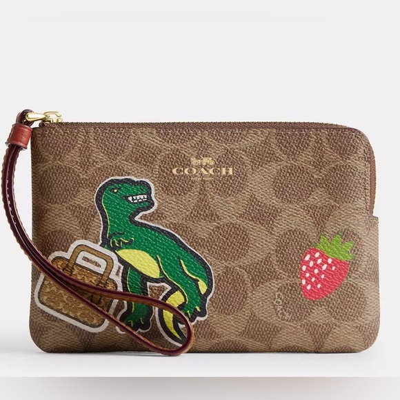 Coach | Bags | Coach Corner Zip Wristlet In Signature Canvas Dinosaur ...